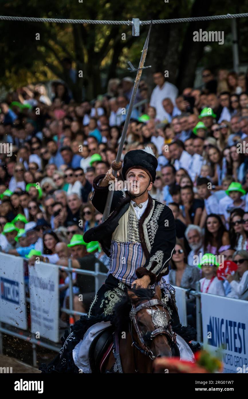 Sinj, Croatia. 06th Aug, 2023. Men wearing traditional knight costumes ...