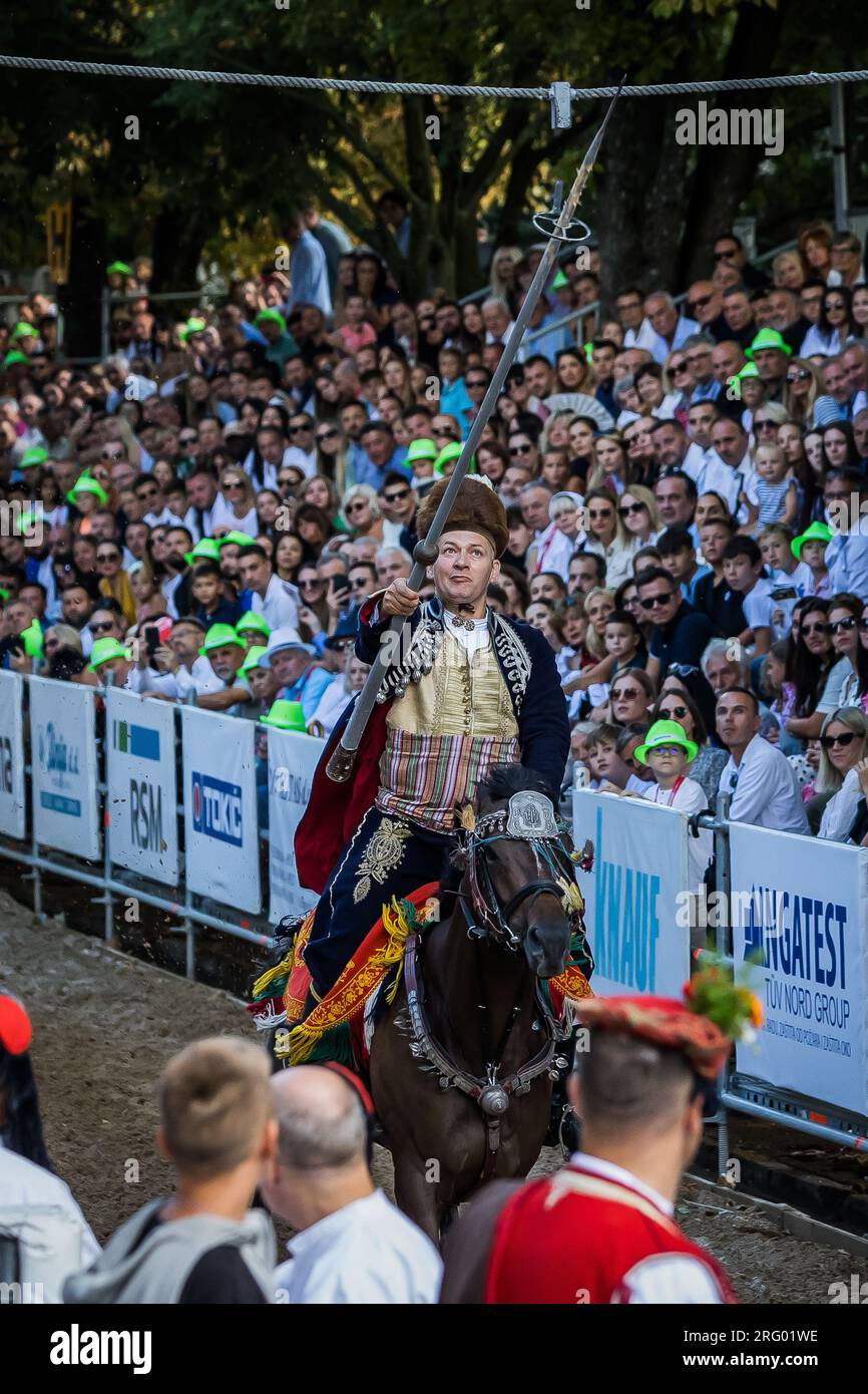 Sinj, Croatia. 06th Aug, 2023. Men wearing traditional knight costumes ...