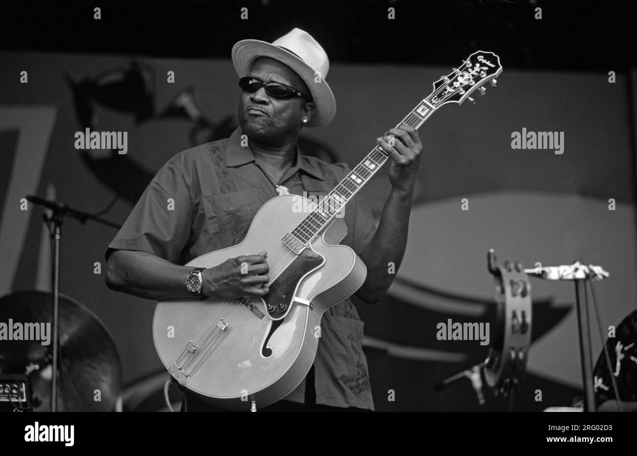 TAJ MAHAL performs with an acoustic guitar at the MONTEREY JAZZ ...