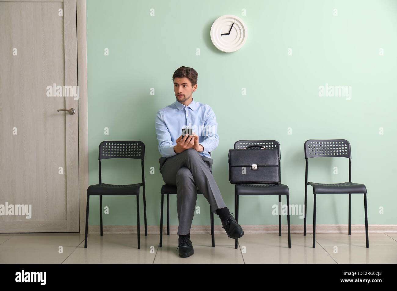 Male applicant mobile phone hi-res stock photography and images - Alamy