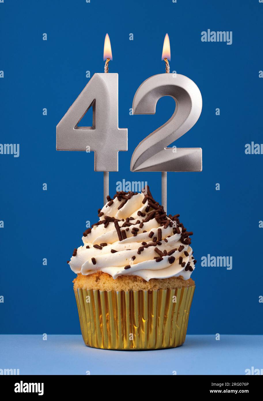Horizontal birthday card with cake - Lit candle number 42 on blue ...