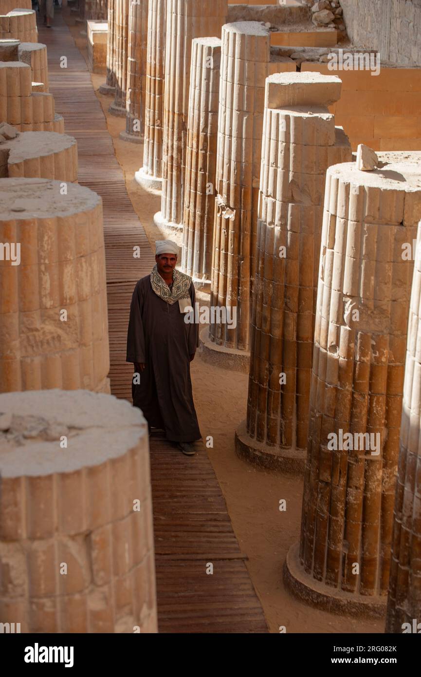 Egypt, Cairo, Giza. Columns line a walkway at Sakkara, the oldest ...