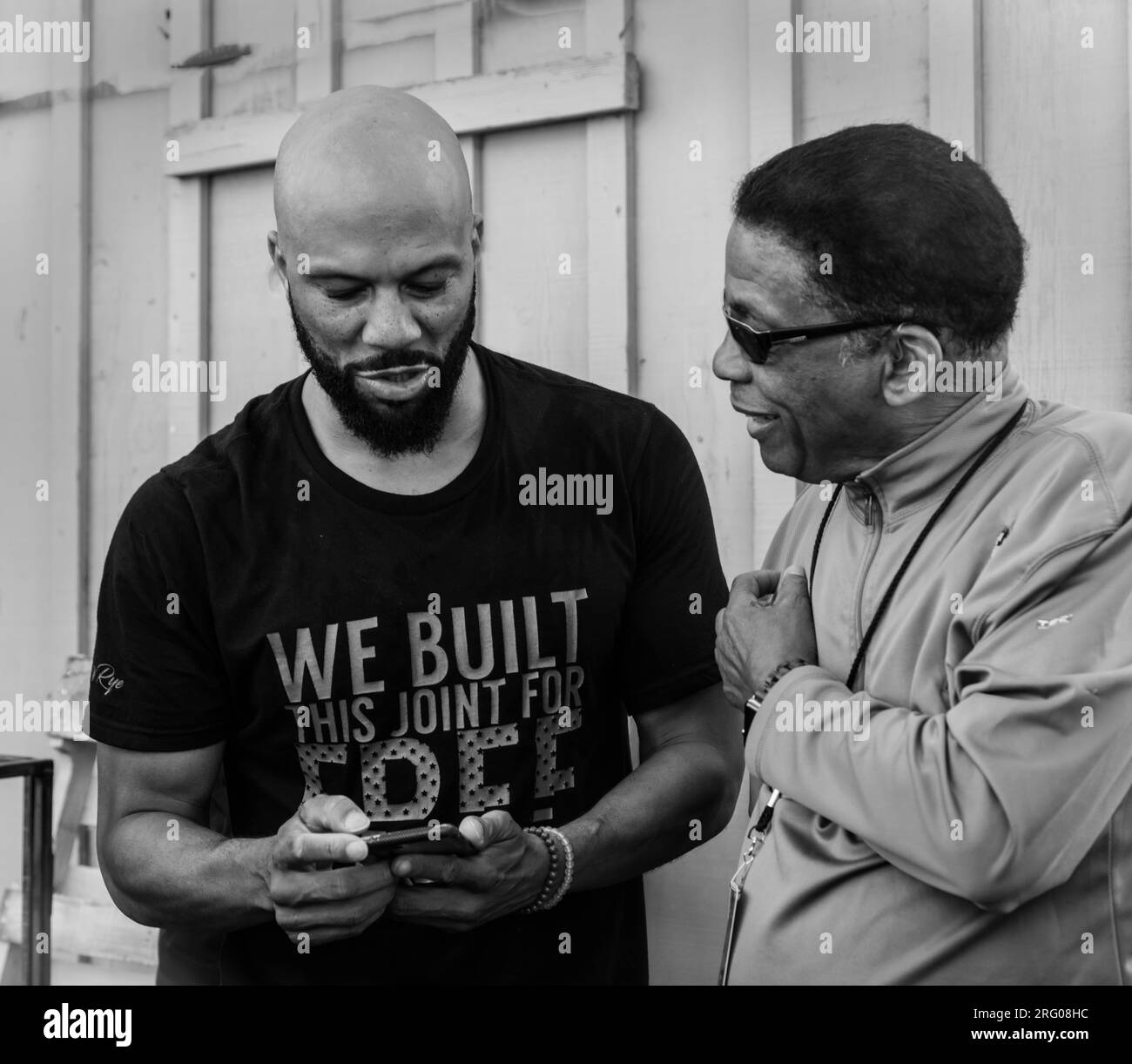 Hip hop artist COMMON talks to HERBIE HANCOCK backstage at the 60th ...