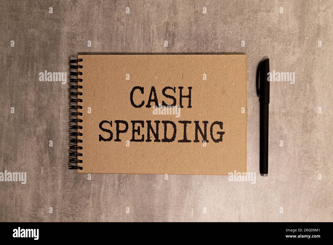 Dollars cash money in rubber band with text written note DEBT PAYOFF ...