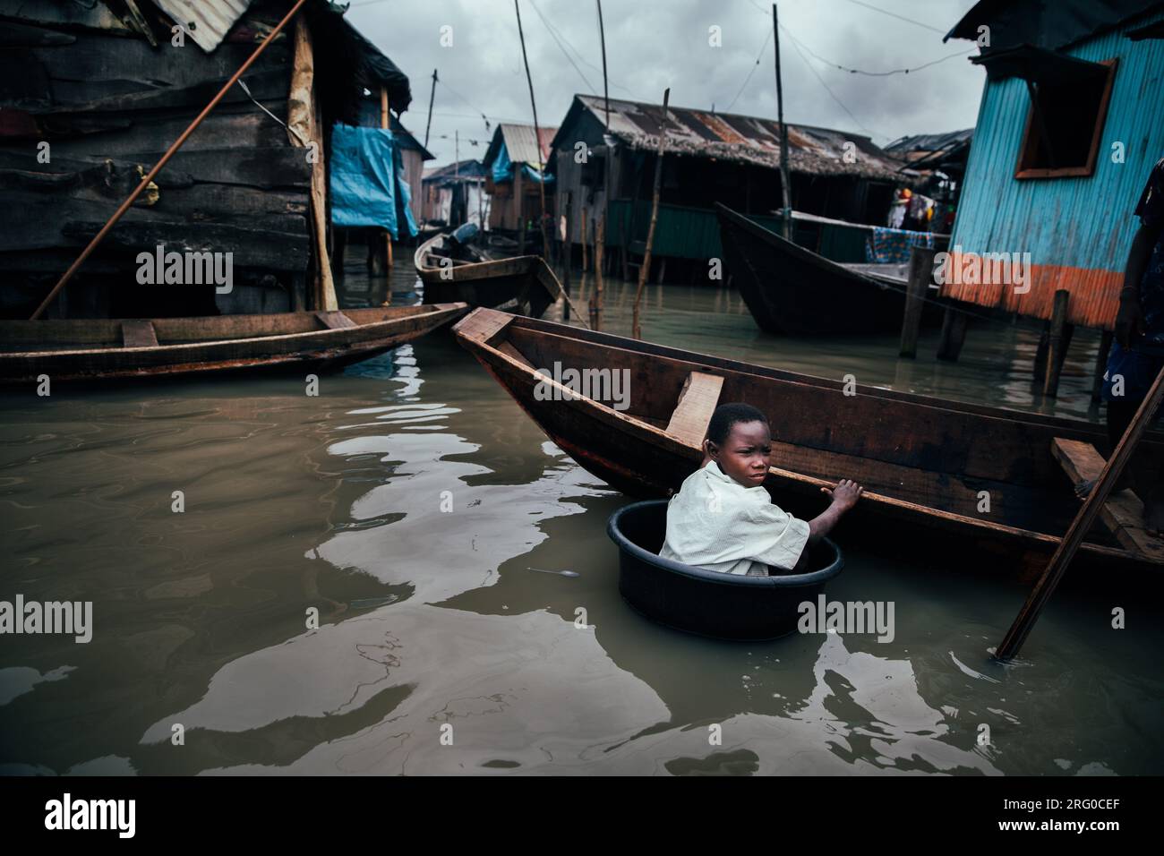 Lagos, Nigeria. 27th July, 2023. People get around in boats during ...