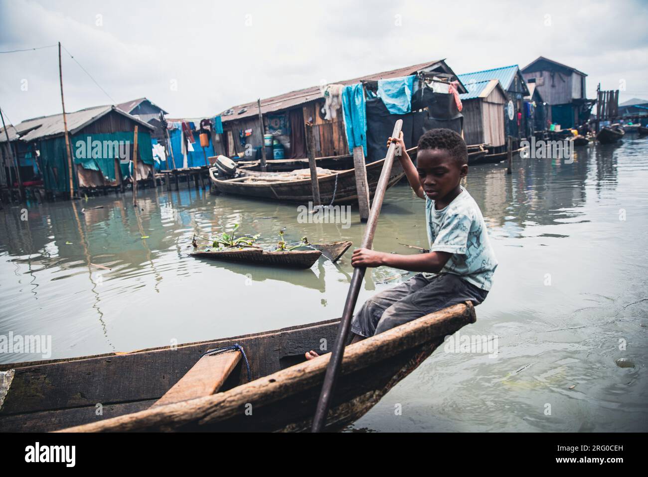 Lagos, Nigeria. 27th July, 2023. People get around in boats during ...