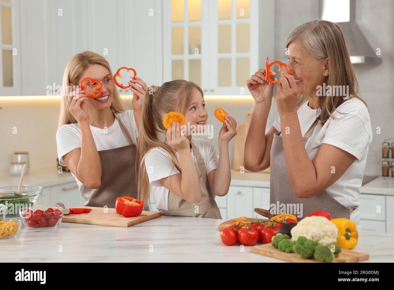 Three generations. Happy grandmother, her daughter and granddaughter ...