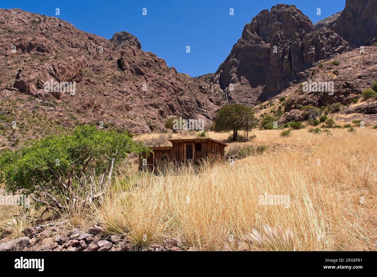 Abandoned mining shack on golden slopes of Organ mountains at the ...
