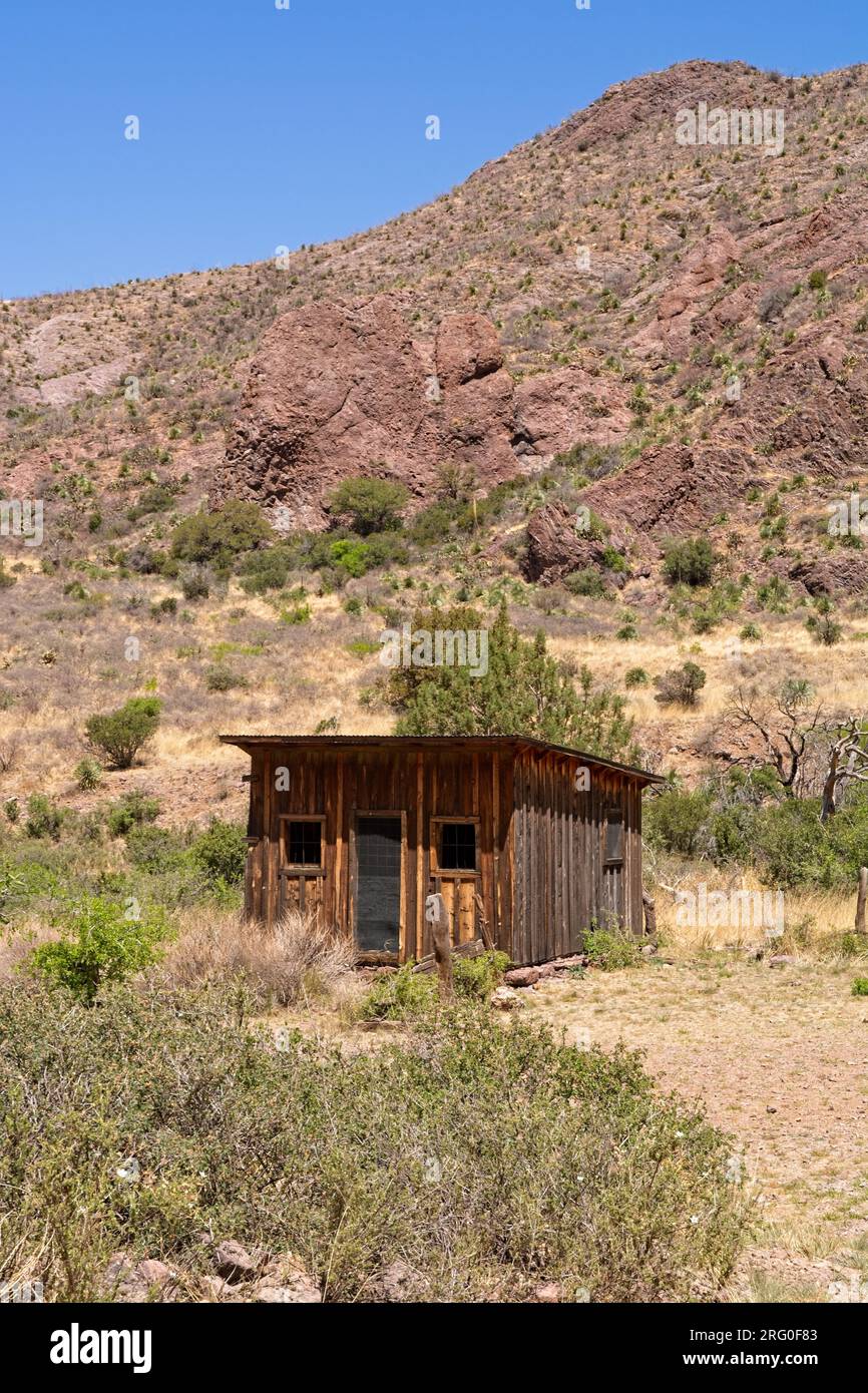 Abandoned mining shack on golden slopes of Organ mountains at the ...