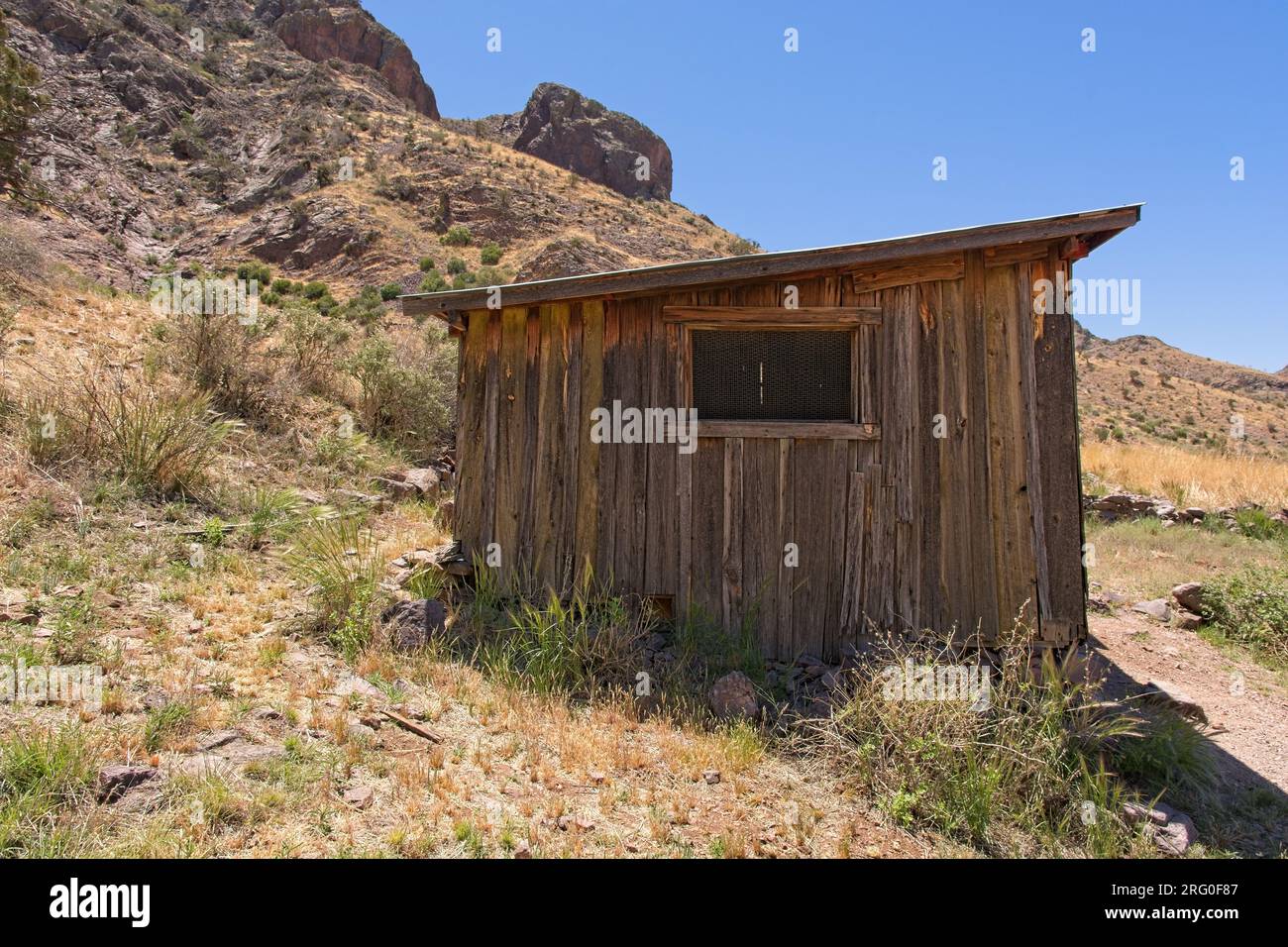 Abandoned mining shack on golden slopes of Organ mountains at the ...