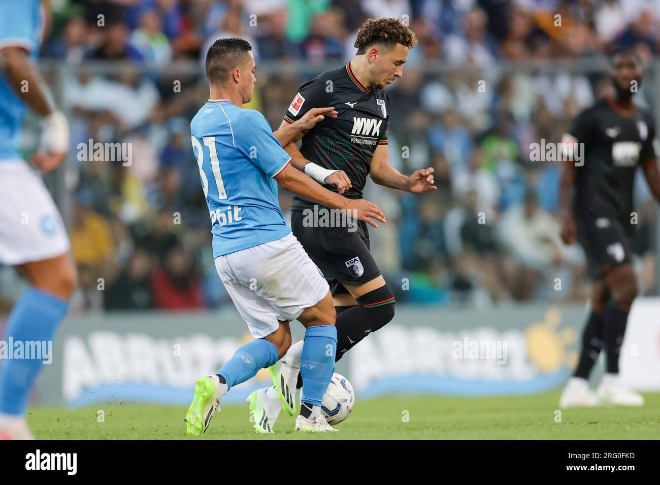 Augsburg's Swiss midfielder Ruben Vargas challenges for the ball with ...