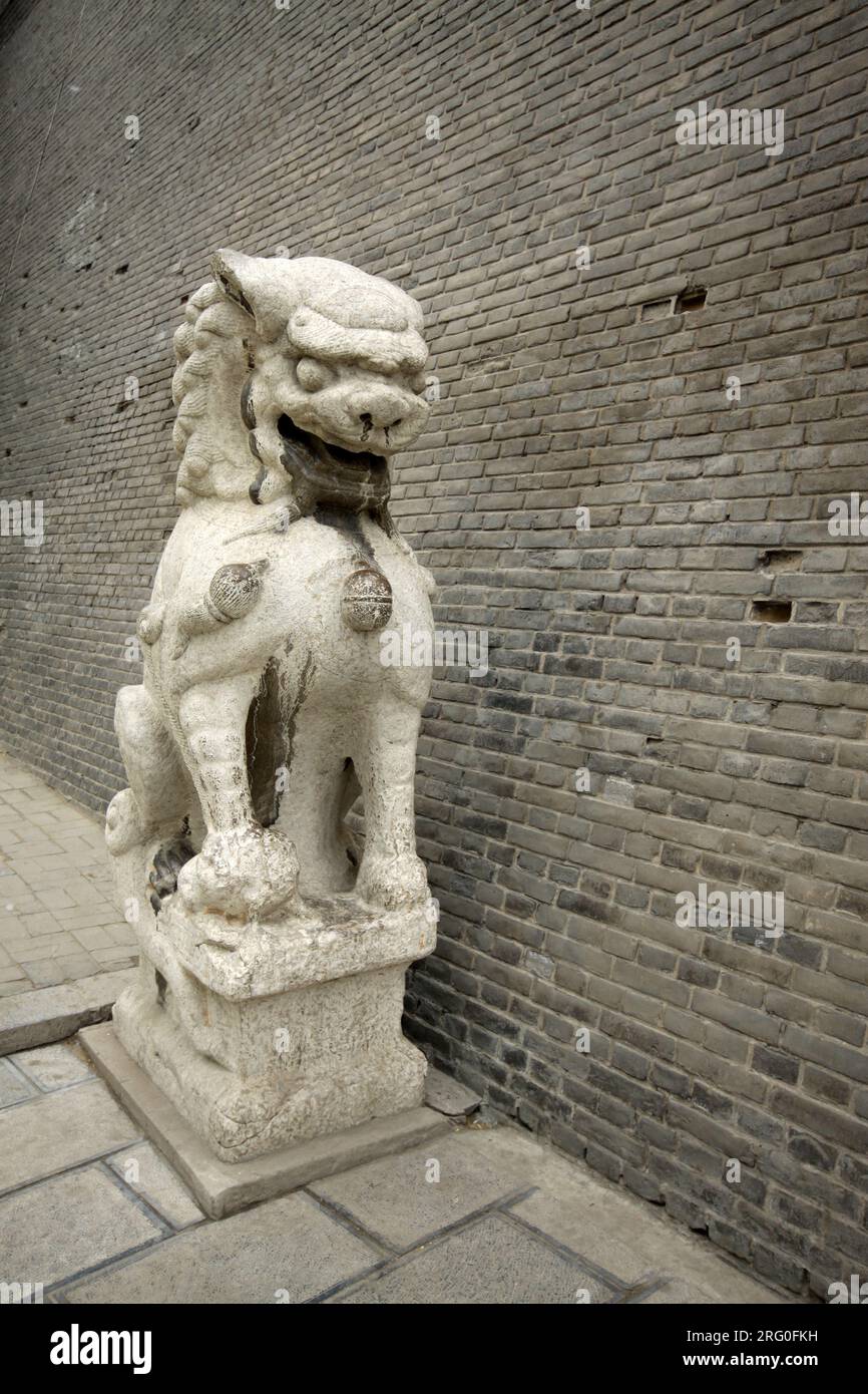 lion stone in a temple, north china Stock Photo - Alamy