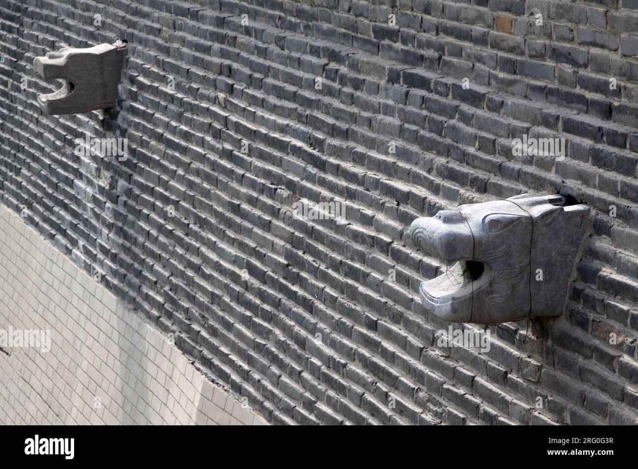 water outlet of the animal model, gray brick wall, traditional Chinese ...