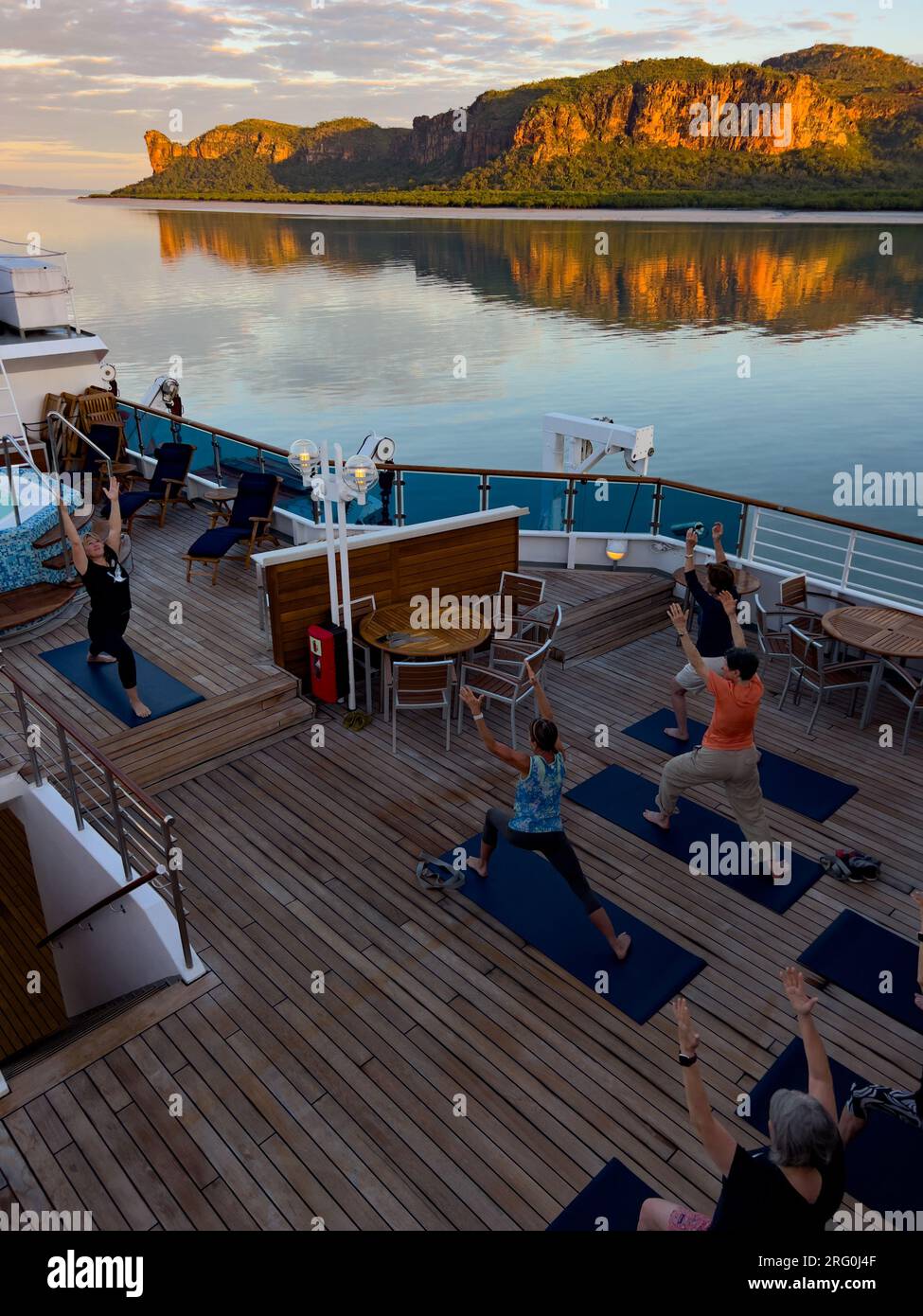 Morning yoga on the National Geographic Orion on the Hunter River in ...
