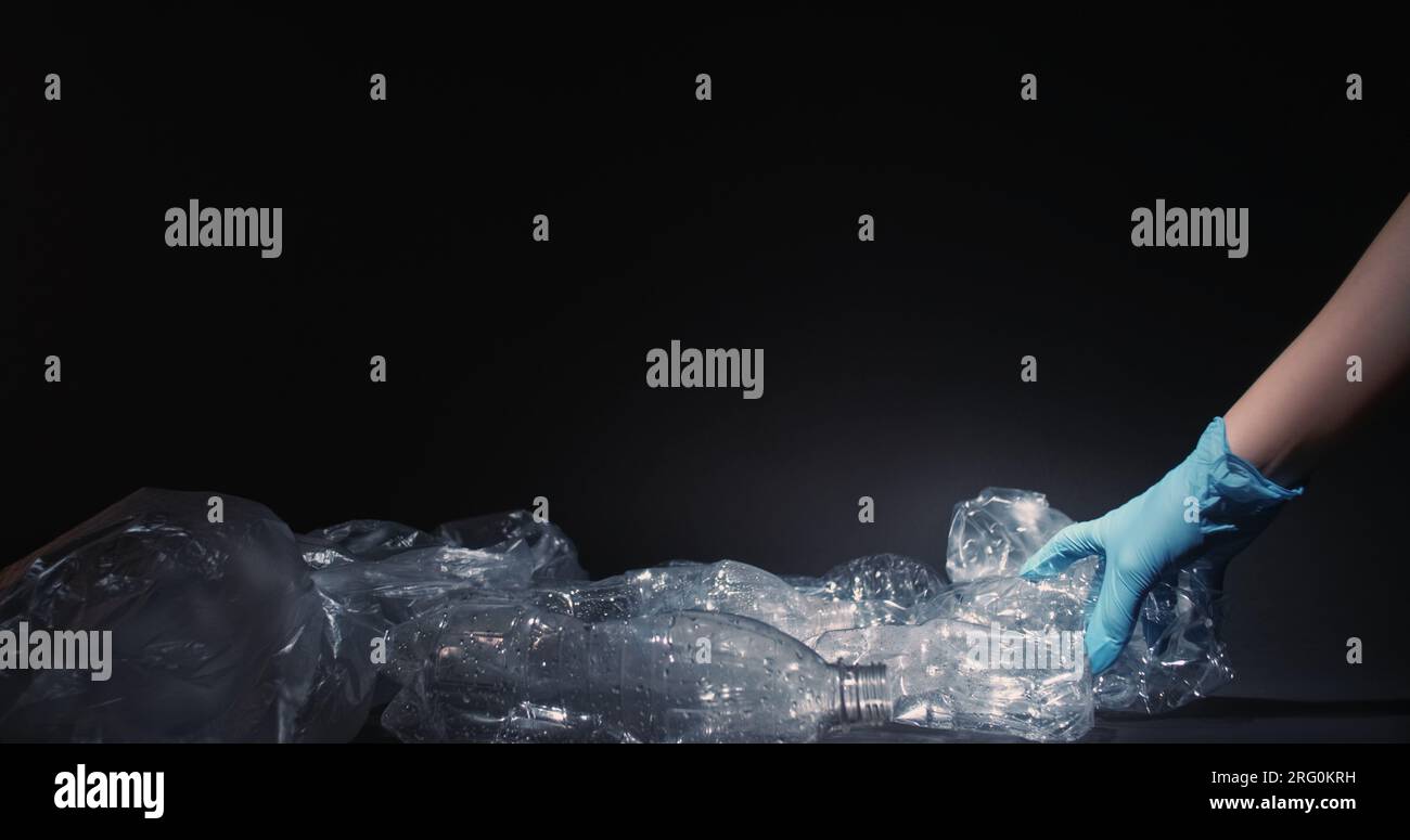 Waste collection recycling plastic volunteer hands Stock Photo - Alamy