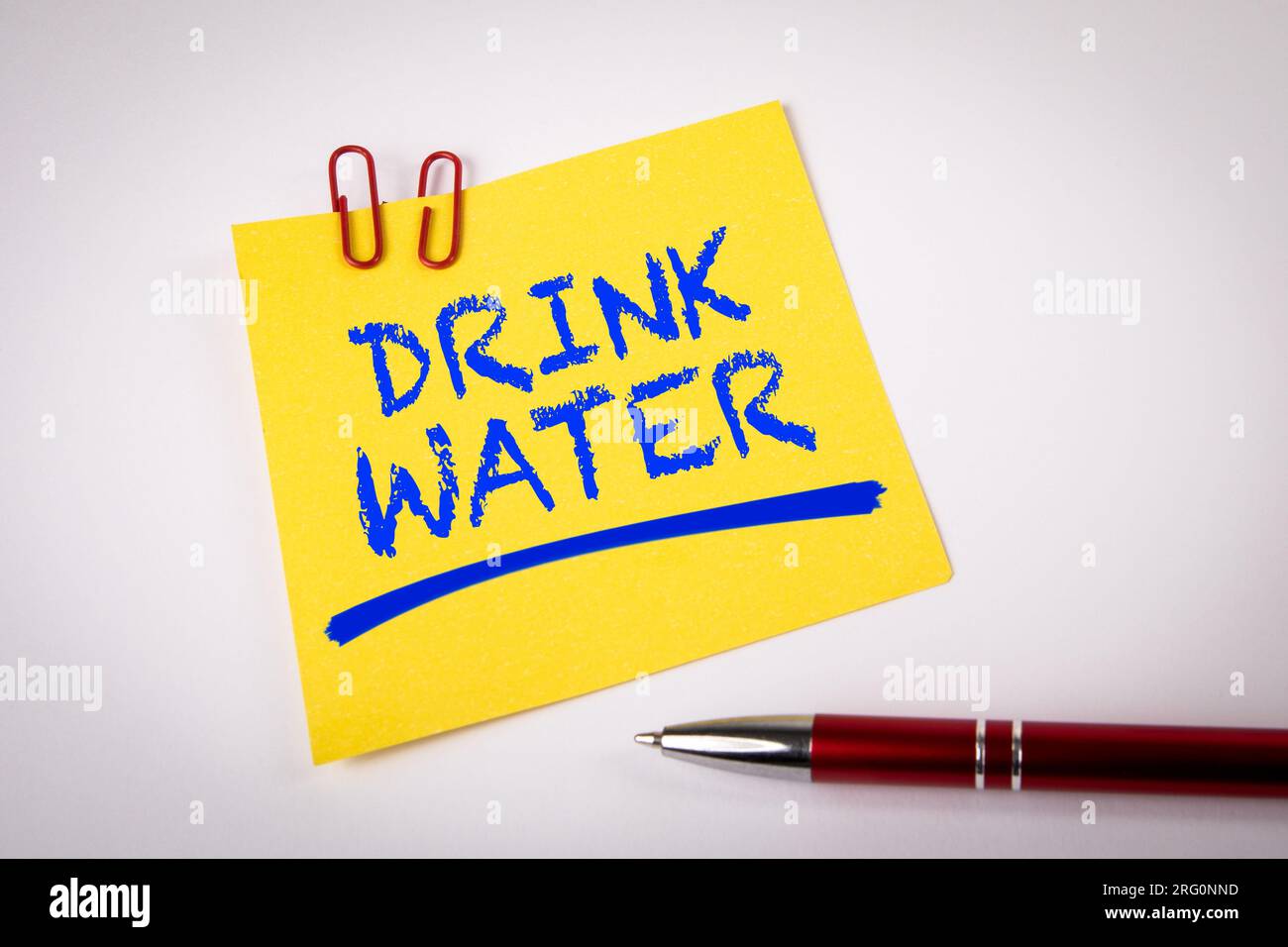 Drink Water. Yellow notepad with written text Stock Photo - Alamy