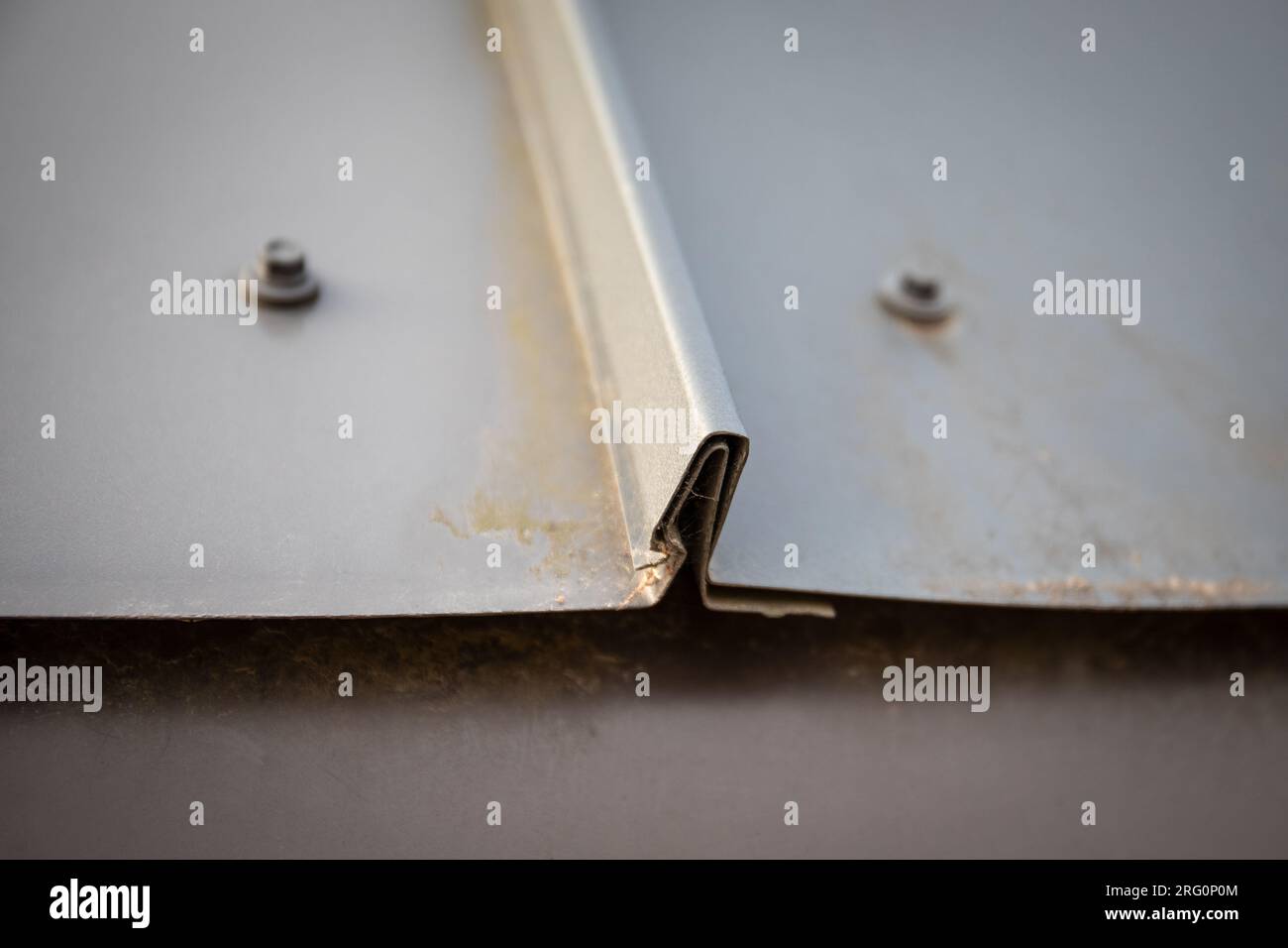 Metal sheet roofing fastener close-up. Construction and repair Stock ...