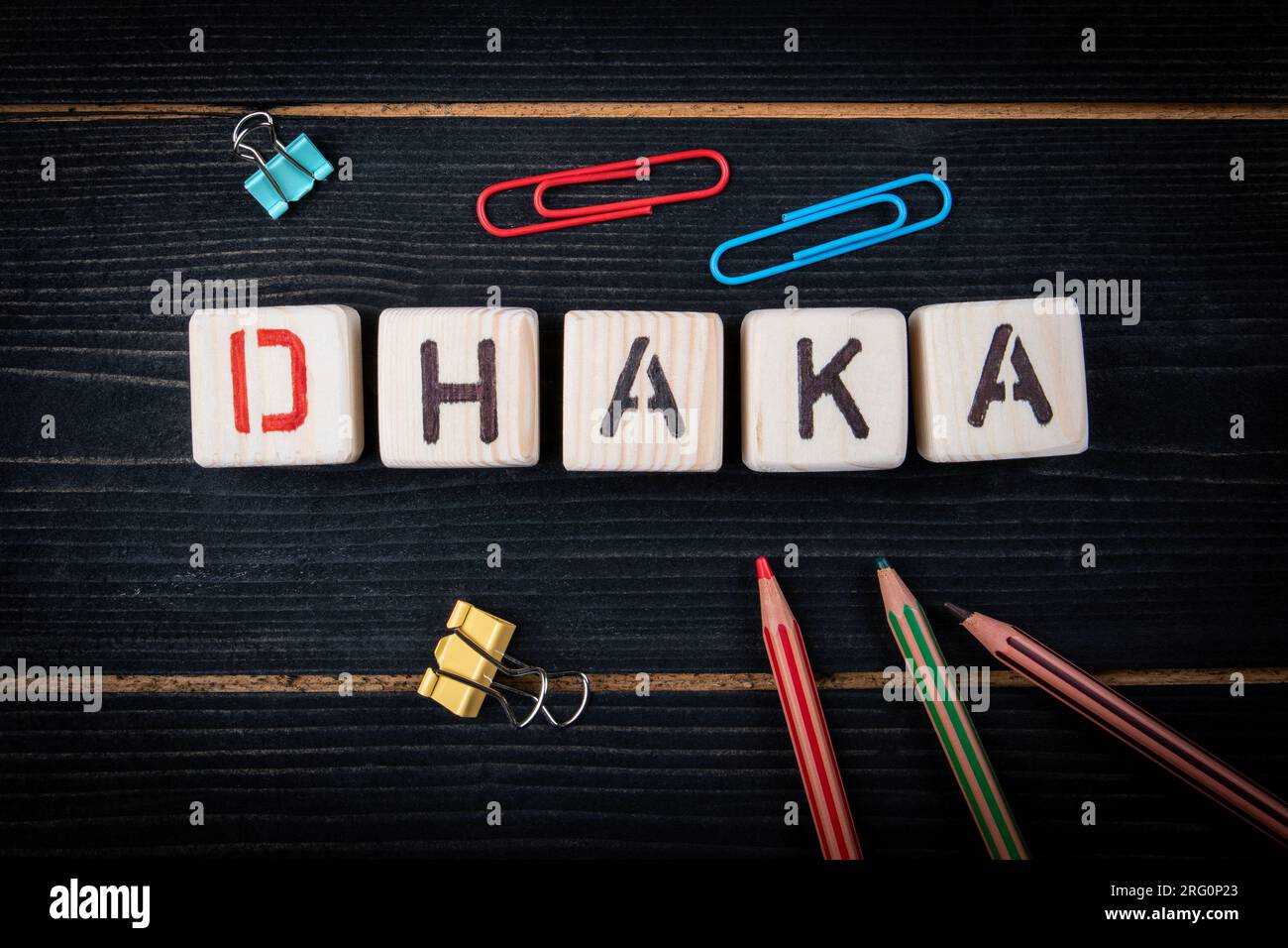 DHAKA city name from alphabet blocks on wood texture background Stock Photo - Alamy