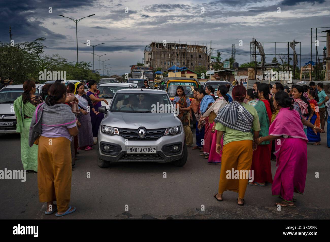 FILE- Members of Meira Paibis, powerful vigilante group of Hindu ...
