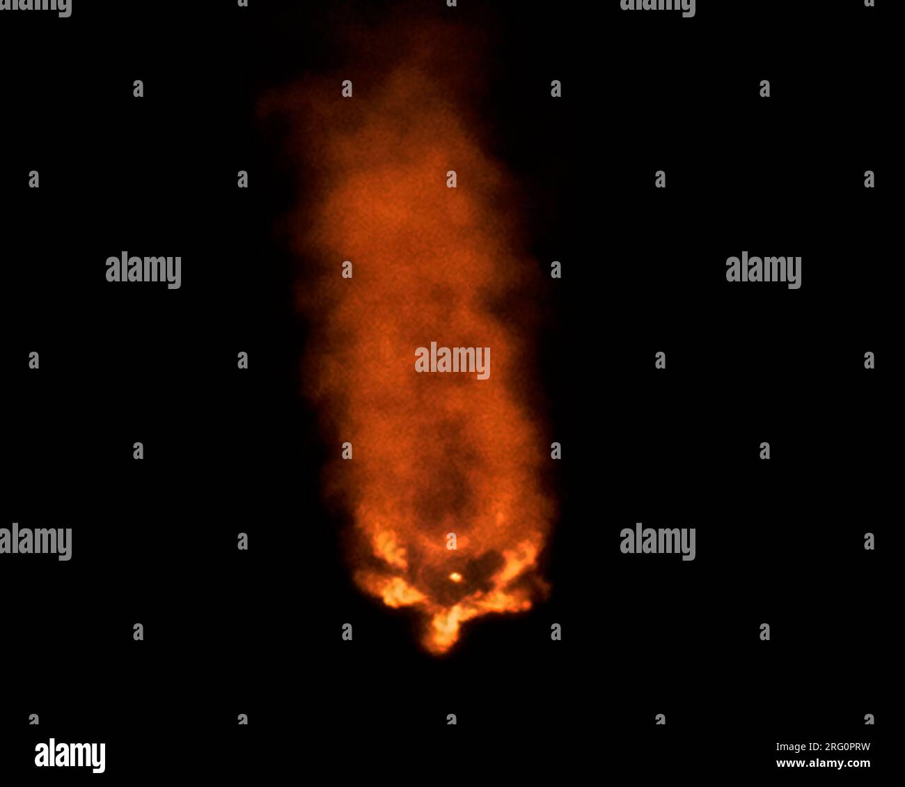 A SpaceX Falcon 9 rocket exhaust plume turns red at altitude as it ...