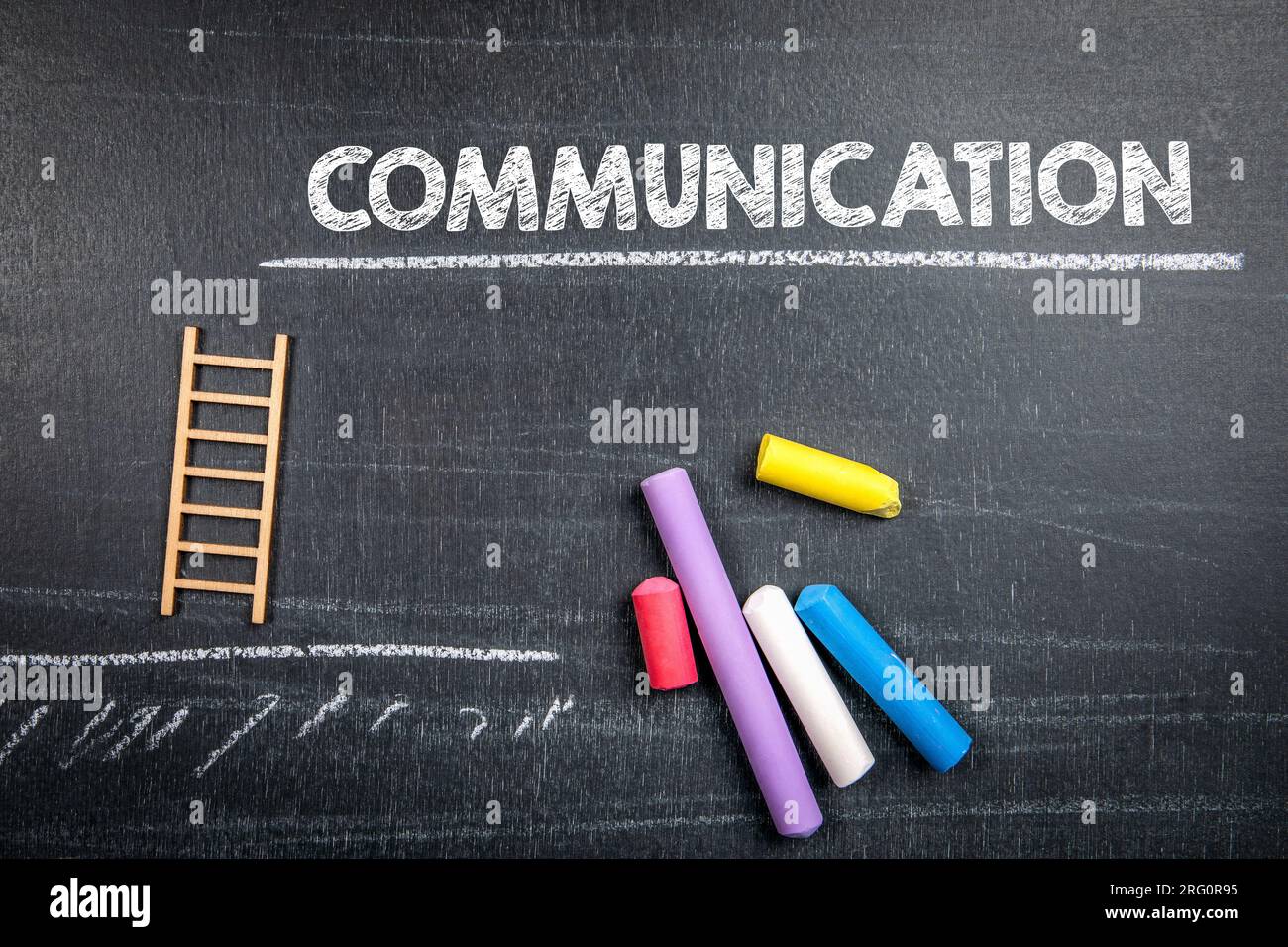Communication Concept. Colored pieces of chalk and text on a dark ...