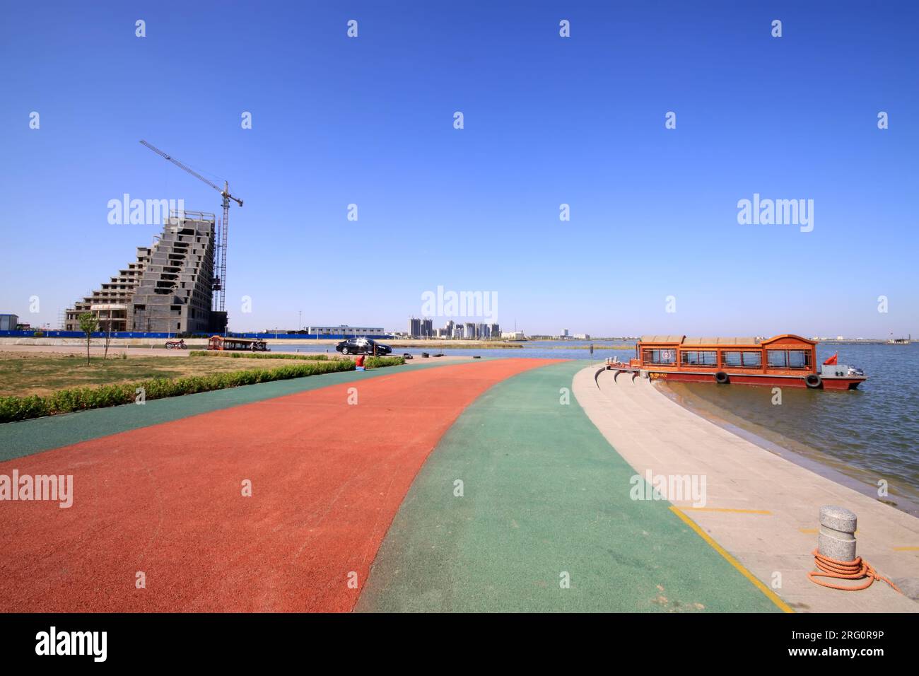 landscape architecture by the lake under the blue sky, Hengshui city ...