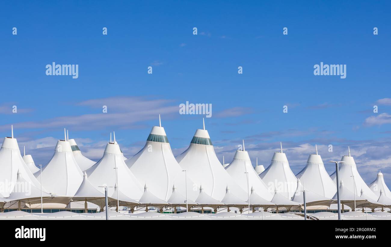 Denver International Airport. Architecture Peaks against the blue sky ...