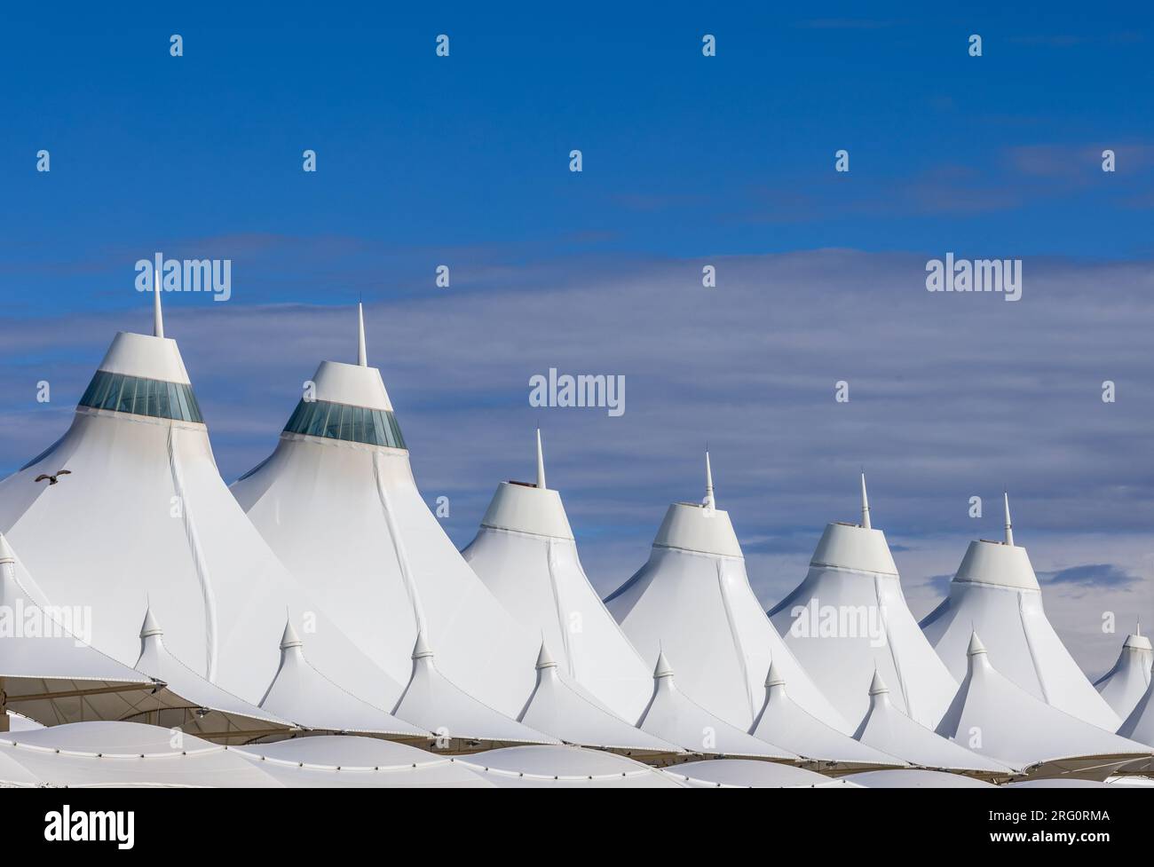 Denver International Airport. Architecture Peaks against the blue sky ...