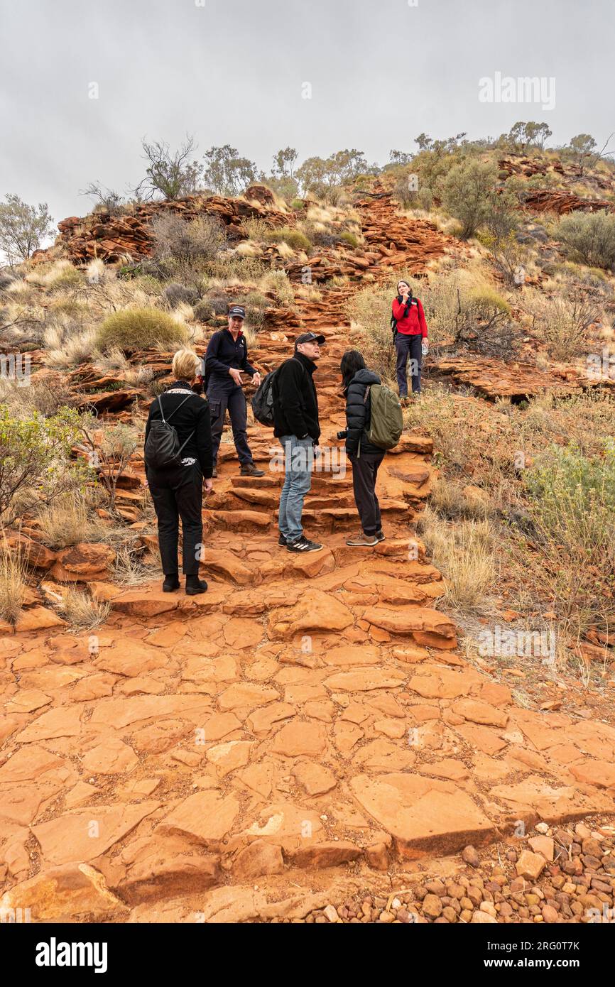 Group of hikers at the start of Kings Canyon Rim Walk, Watarrka ...