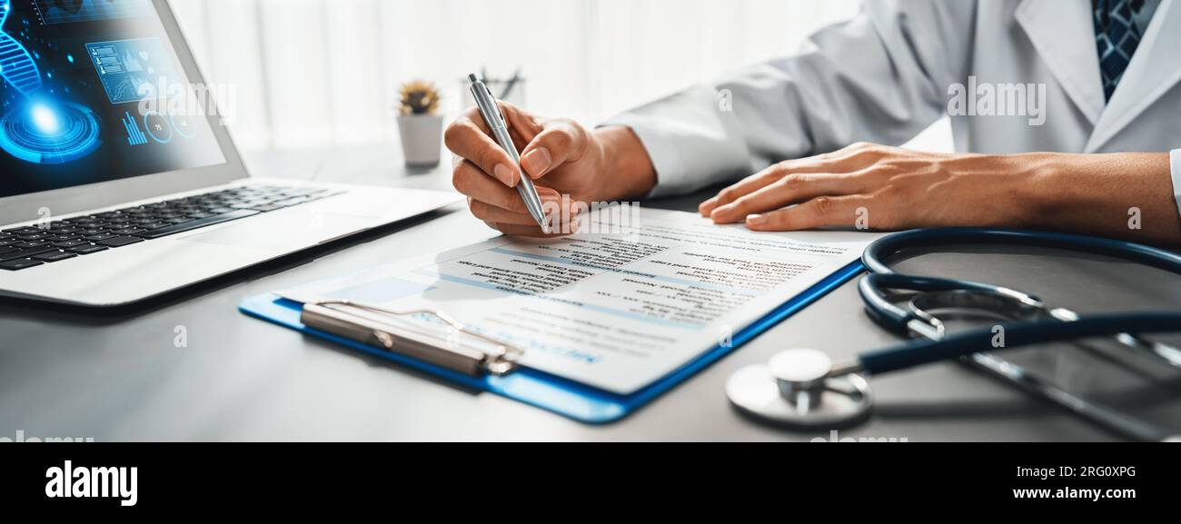 Doctor studying genetic disease in DNA research with laptop, analyze ...