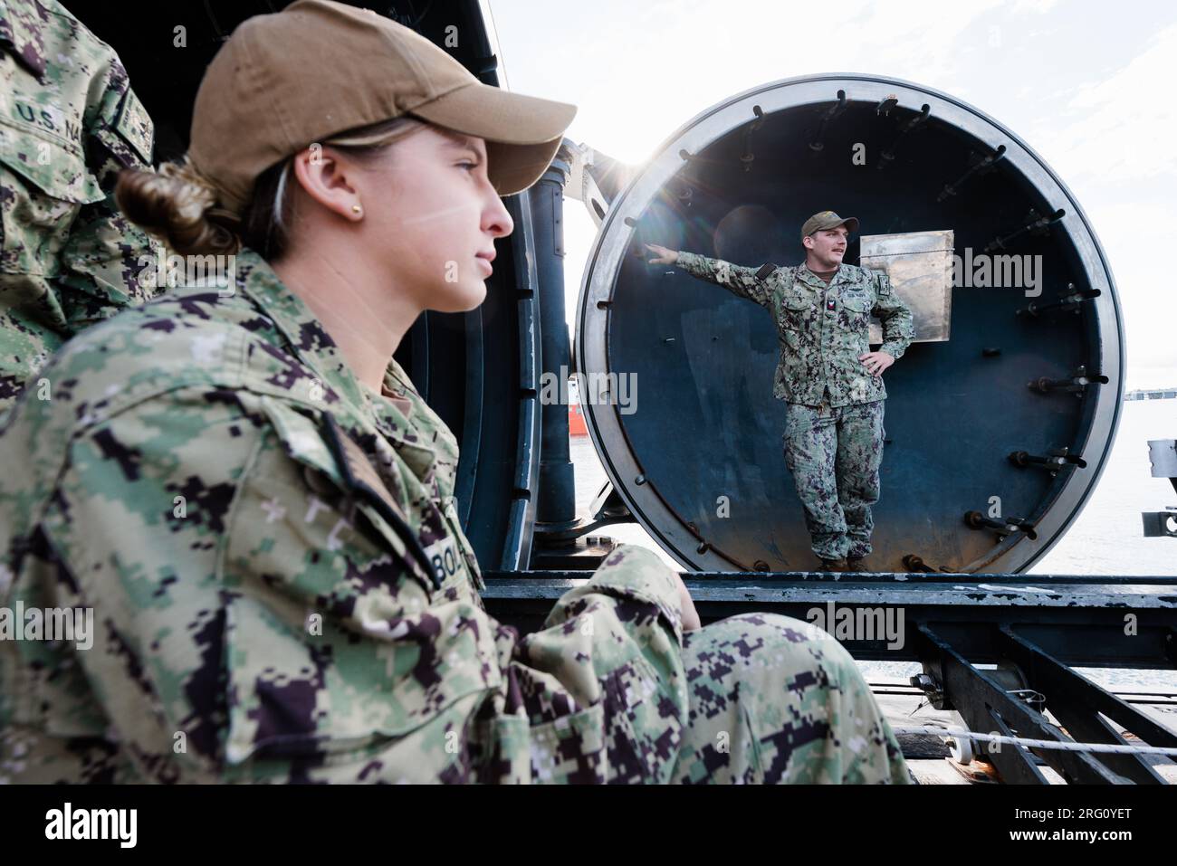Crew members are seen in the dry dock shelter onboard the USS North ...