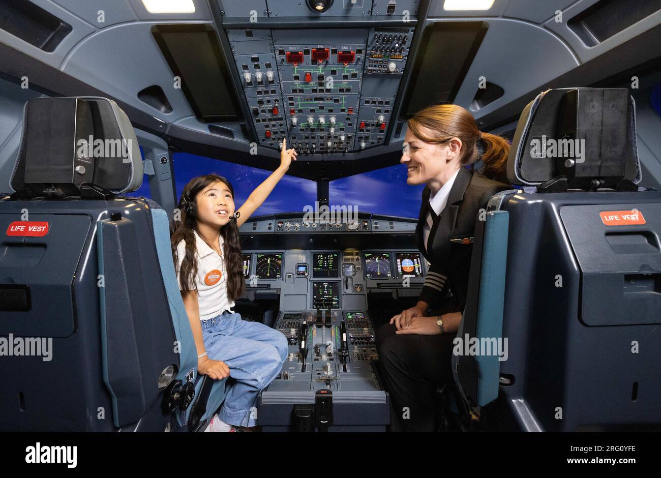 EDITORIAL USE ONLY Rei Diec, aged 8 with Training Captain, Kate West at ...