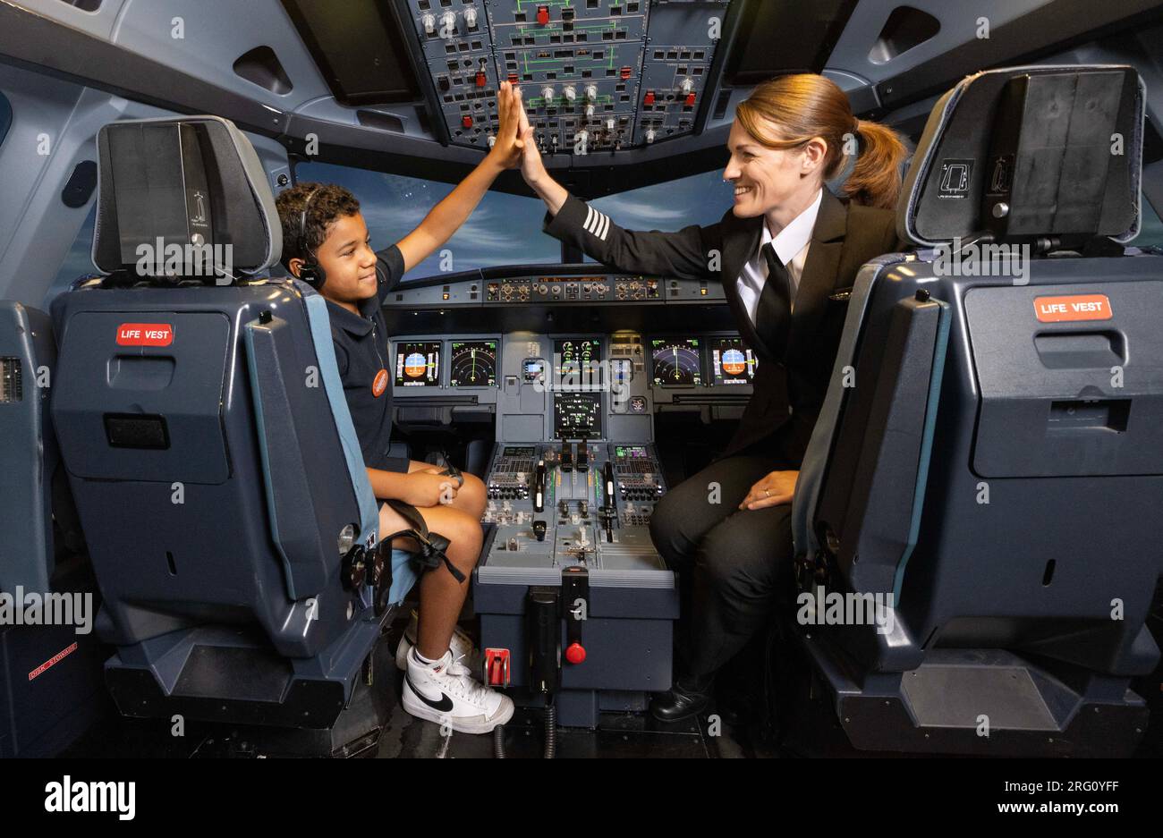 EDITORIAL USE ONLY Seb Williams-Barrow, aged 9 with Training Captain ...