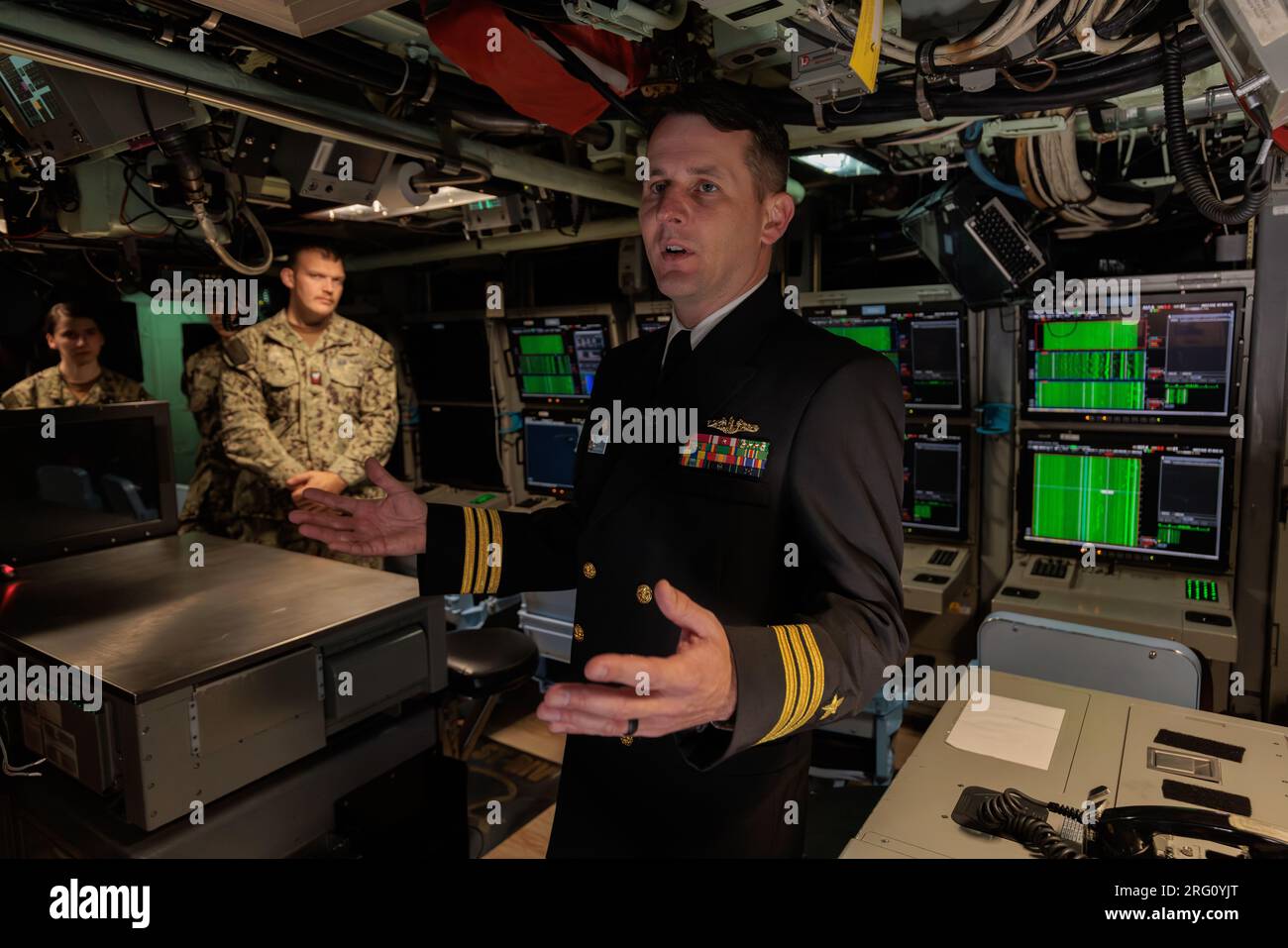 Commander Tad Robbins, Commanding Officer of the USS North Carolina, a ...