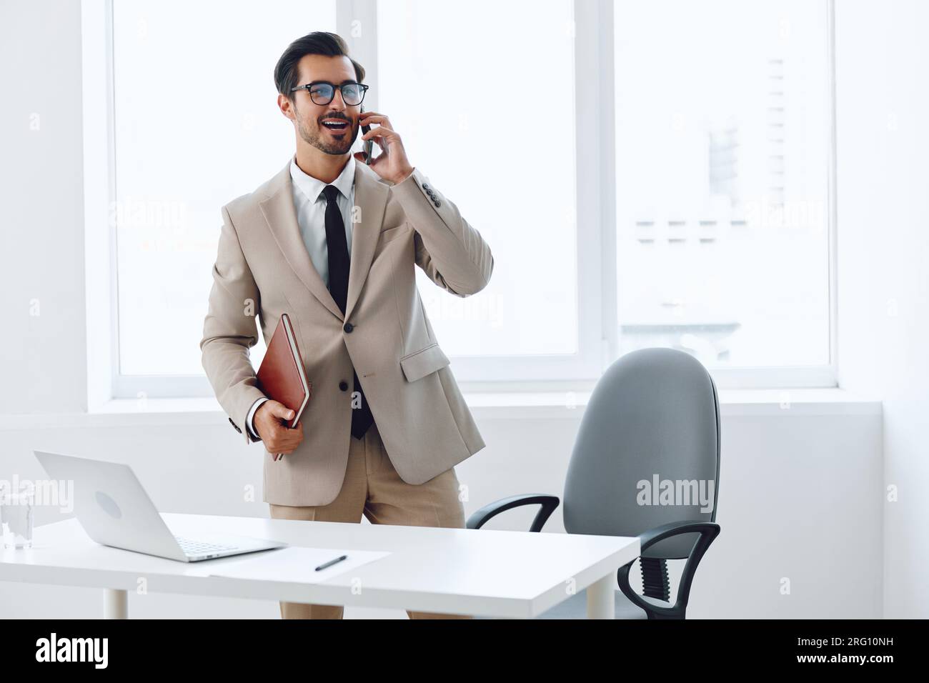 Office man businessman winner call phone smile computer talk laptop ...