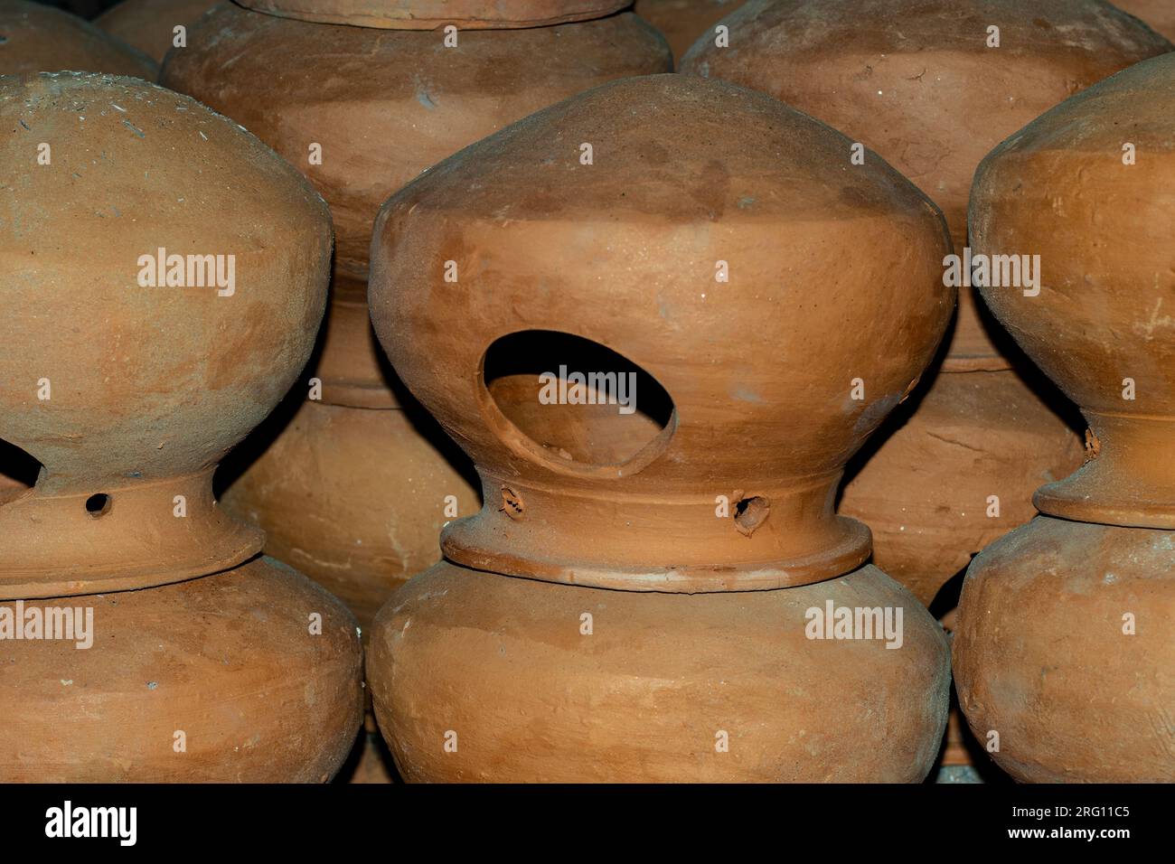 Burned Clay pots are made using a very old traditional pottery ...