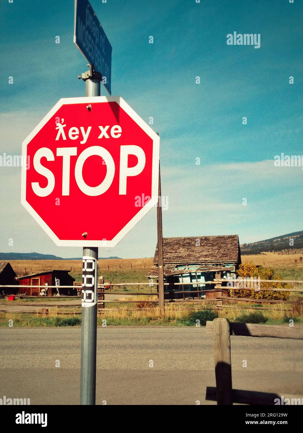 British Columbia, Canada - October 01, 2021: Bilingual stop sign in ...