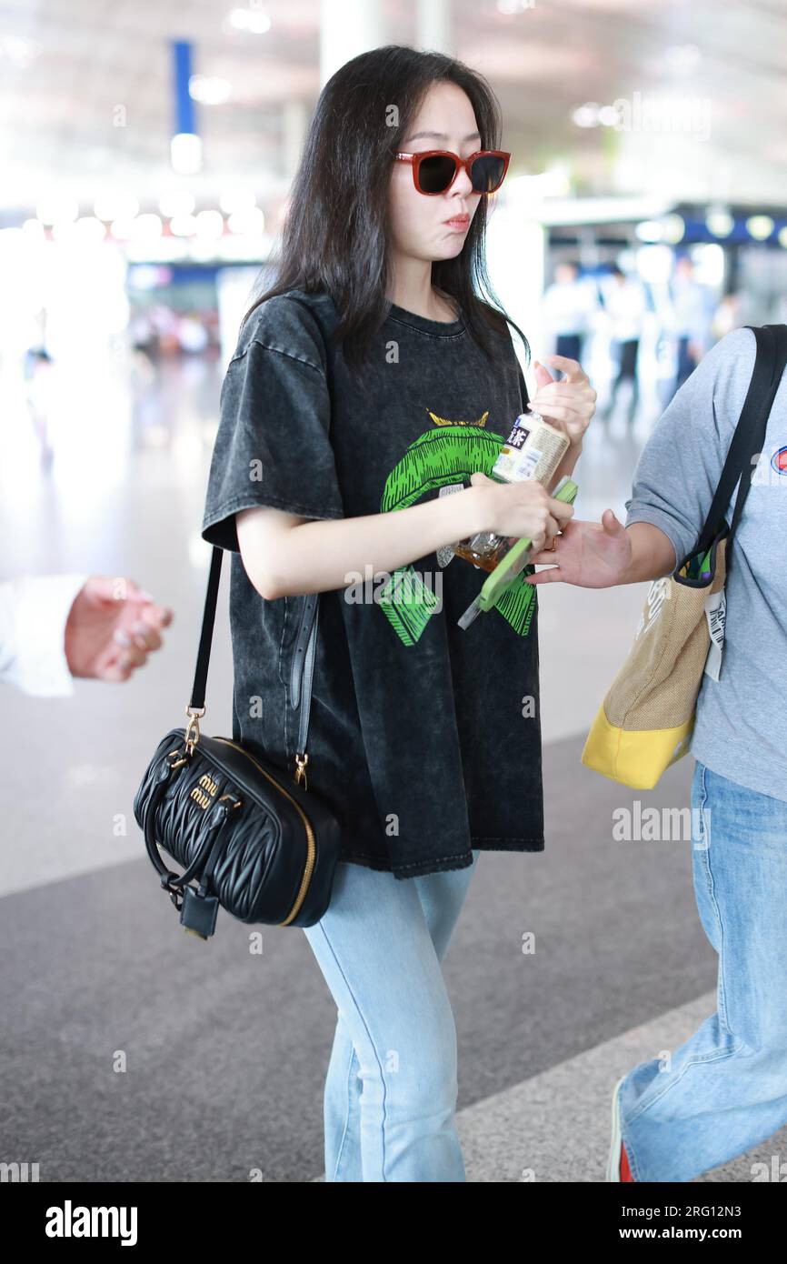 Chinese singer-songwriter Jane Zhang appears at airport in Beijing, China. 4th Aug, 2023. (Photo ...