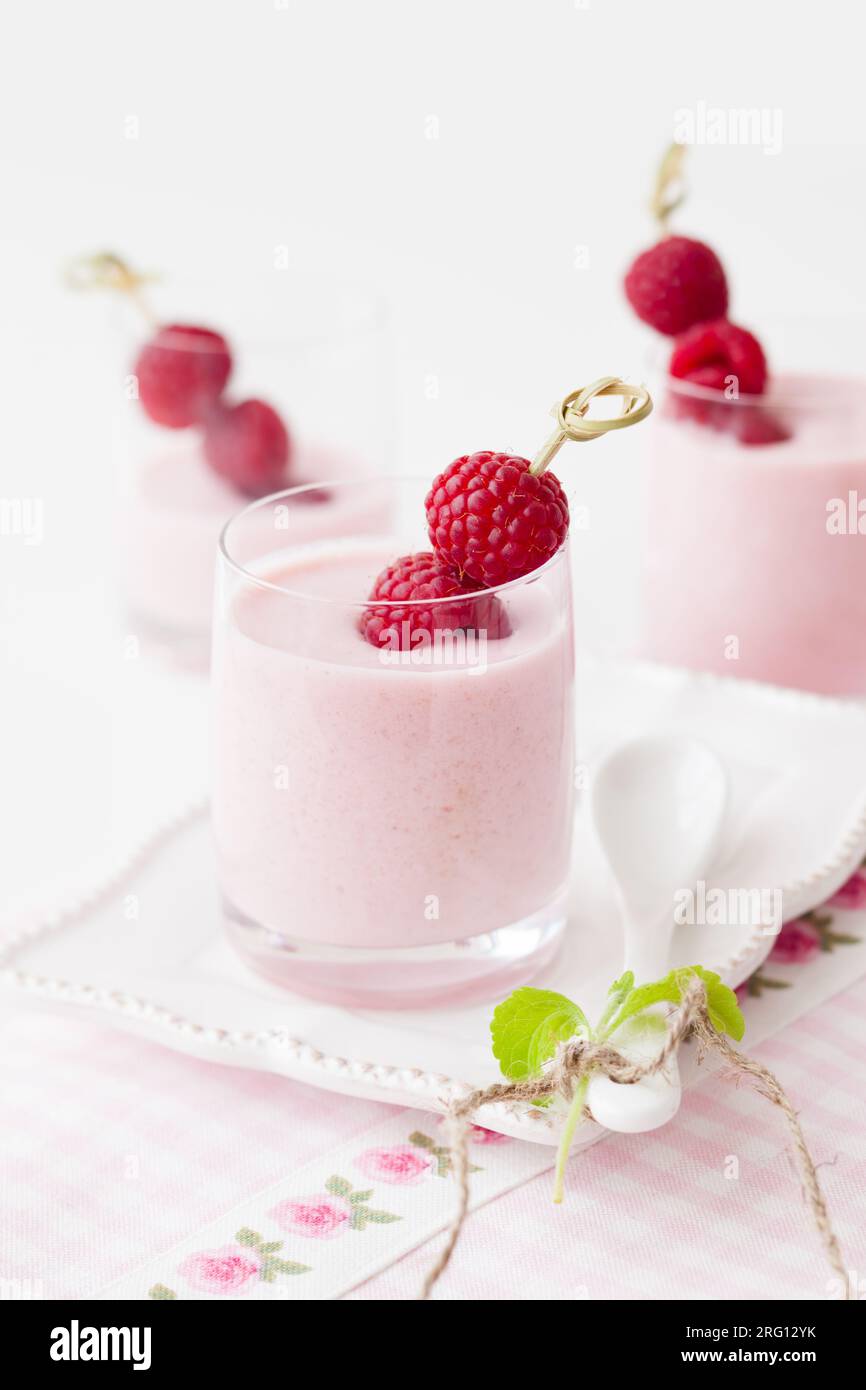 fresh fruit yogurt with raspberry Stock Photo - Alamy