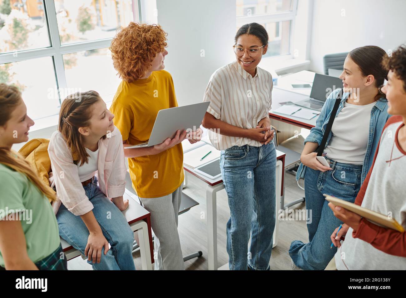 Black teenagers talking in classroom hi-res stock photography and ...