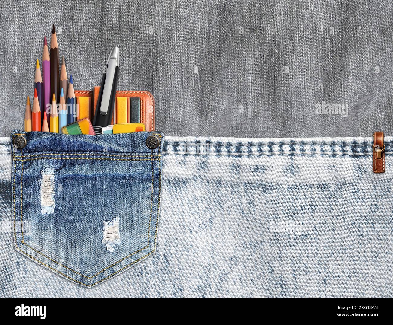 Back to school. Pencils and pens in denim pocket. Jeans pocket with ...