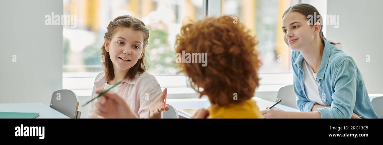 Teen boy talking classroom hi-res stock photography and images - Alamy