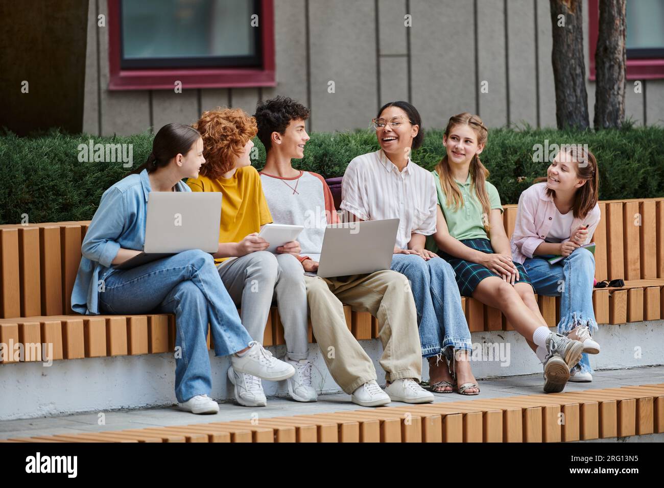 Students talking outside classroom hi-res stock photography and images ...