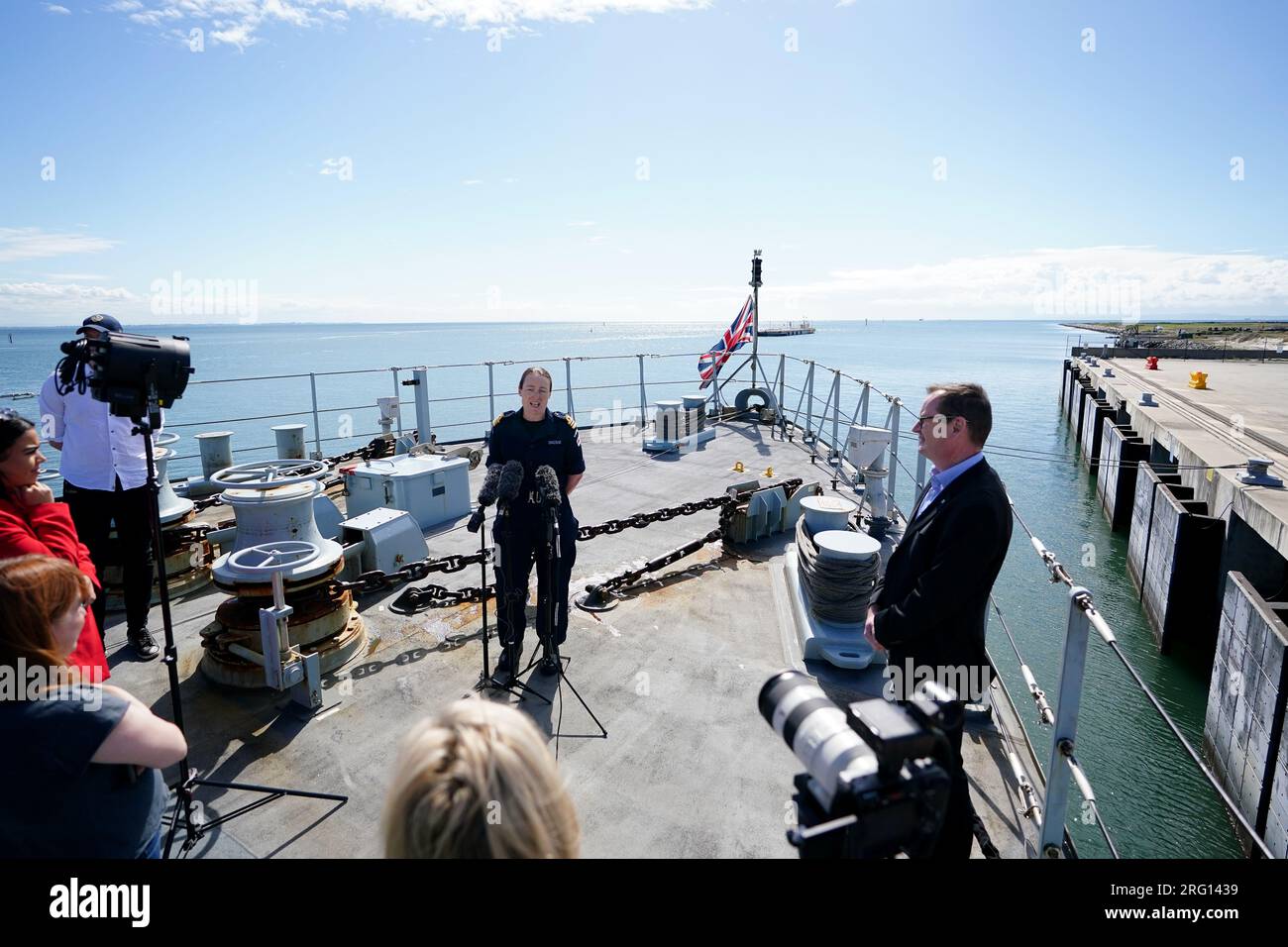 Commanding Officer Bridget MacNae speaks to the media from aboard HMS ...