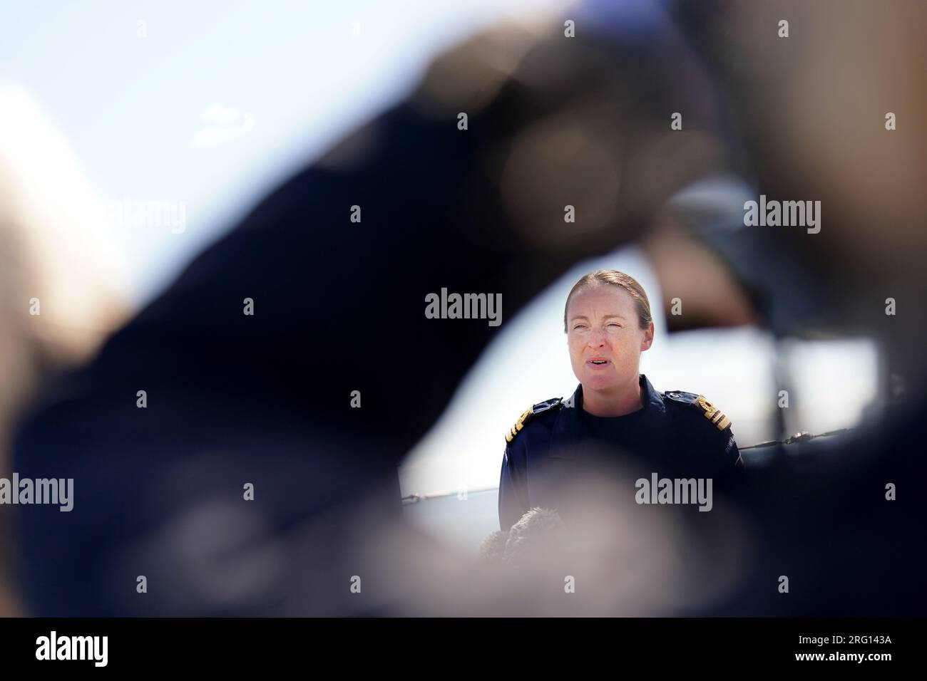 Commanding Officer Bridget MacNae speaks to the media from aboard HMS ...