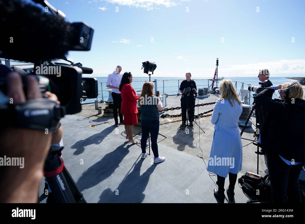 Commanding Officer Bridget MacNae speaks to the media from aboard HMS ...