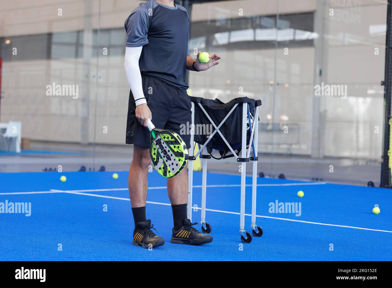 Padel Instructor Teaching the Game Techniques Stock Photo - Alamy