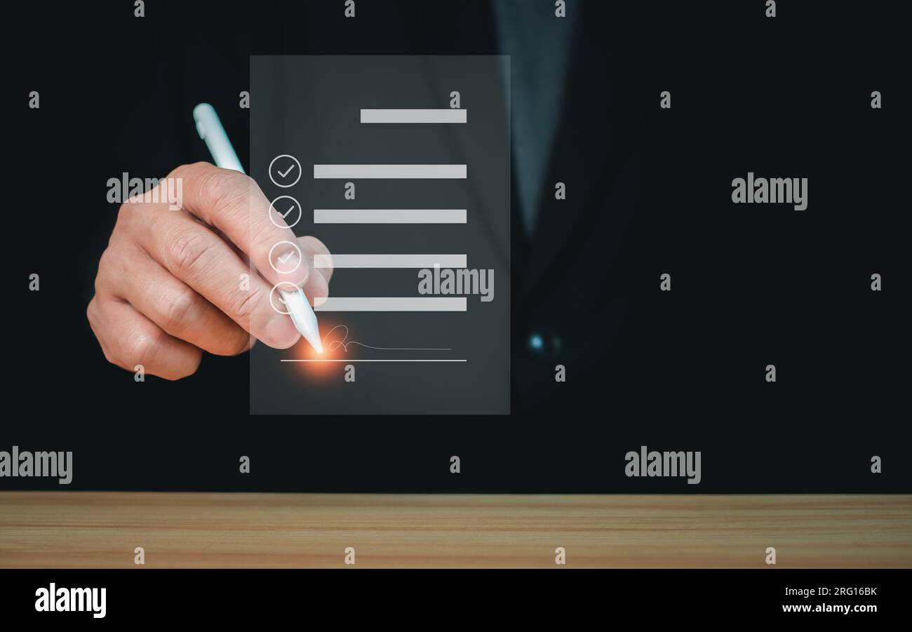 ฺBusinessman use electronic pen sign signature on electronic E-signing ...