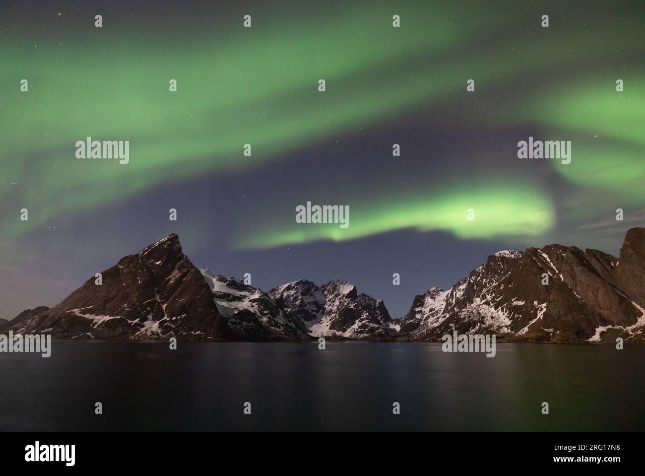Picturesque view of green polar lights in auroral zone displaying in ...