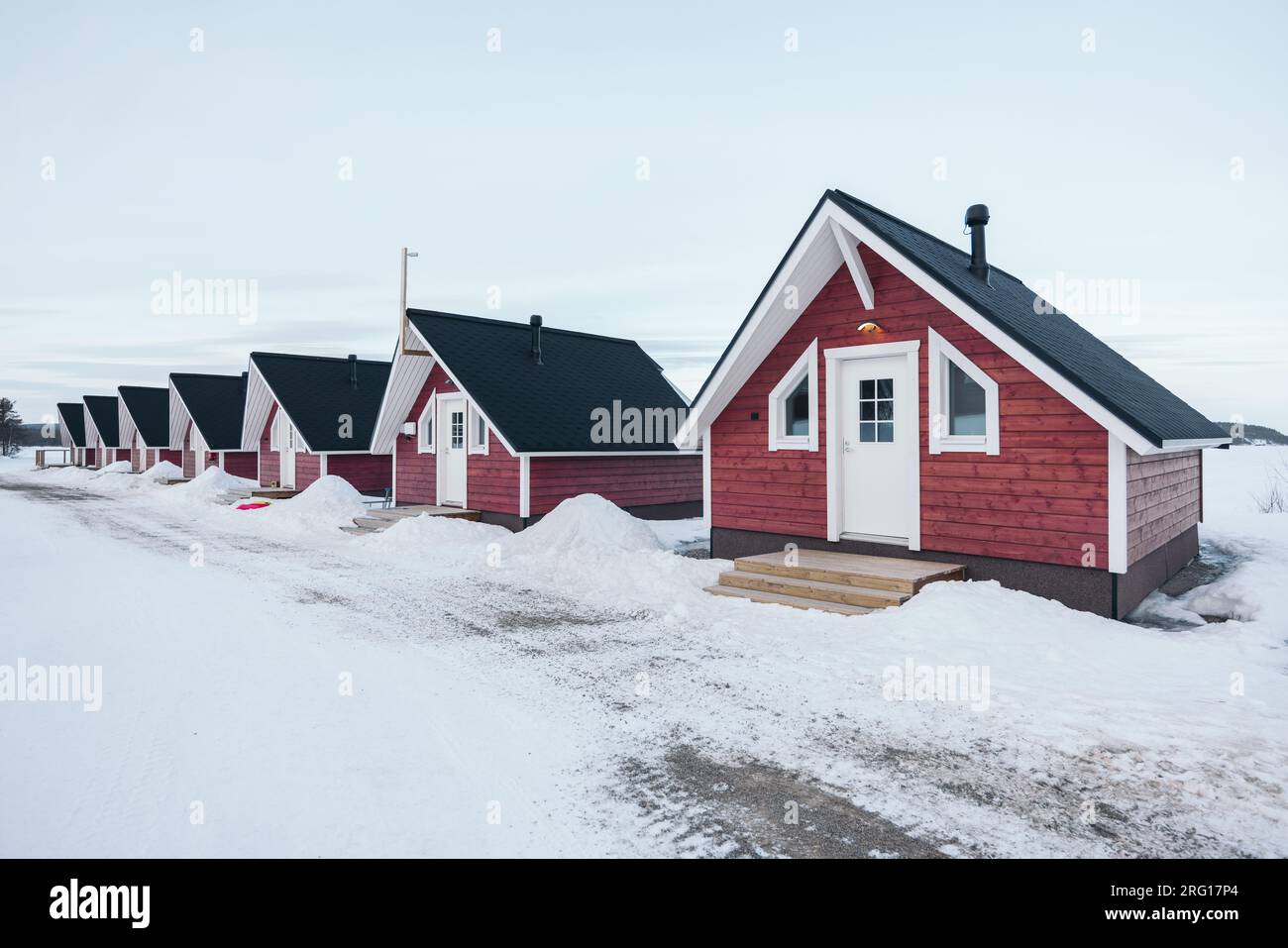 Exterior of residential red brick walled wooden roof with chimney ...